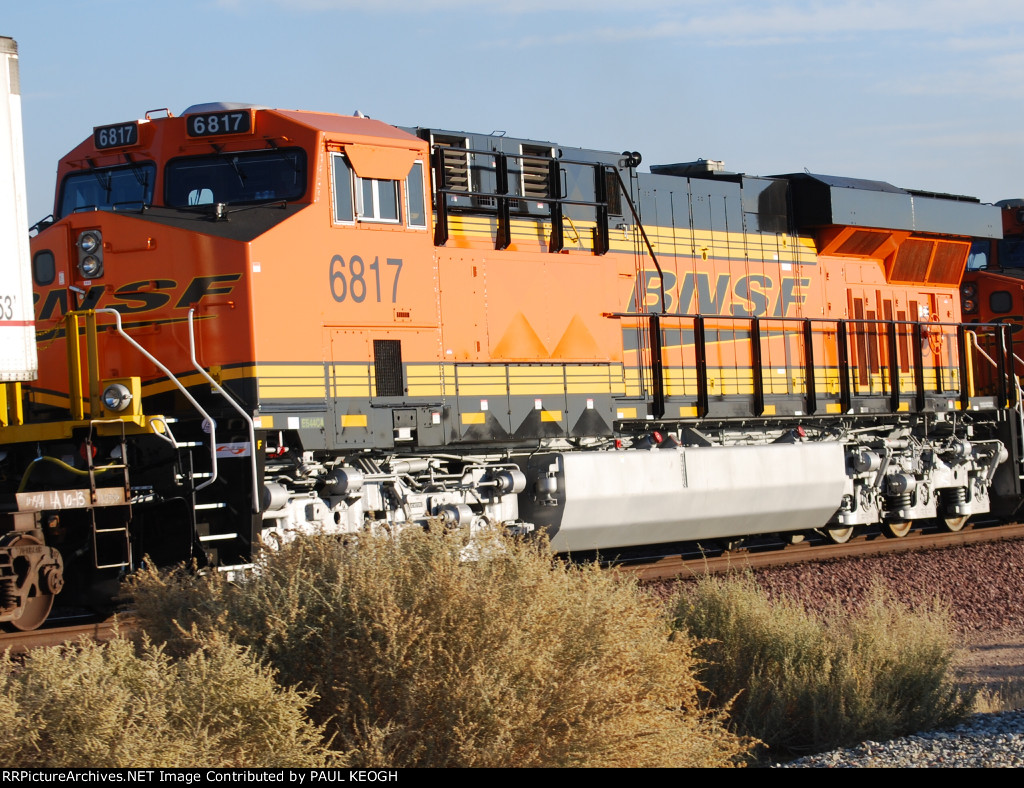 BNSF 6817 passes me by as heads east as a #4 unit pulling a Z out of LA.